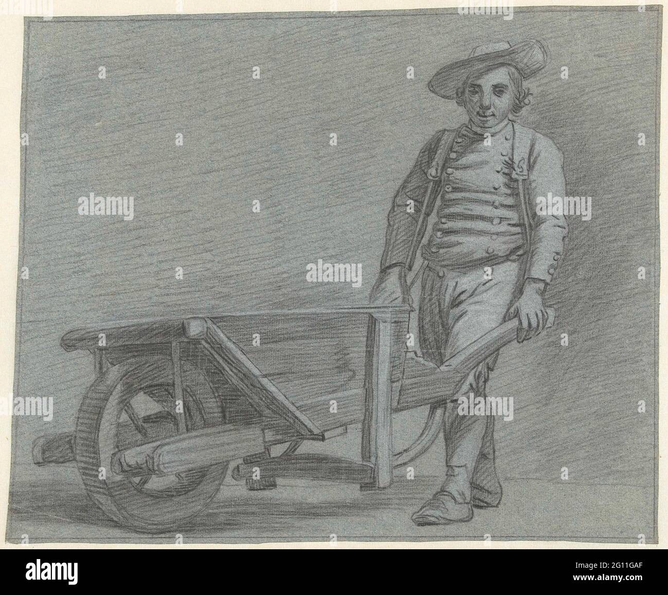 Standing man with wheelbarrow Stock Photo - Alamy