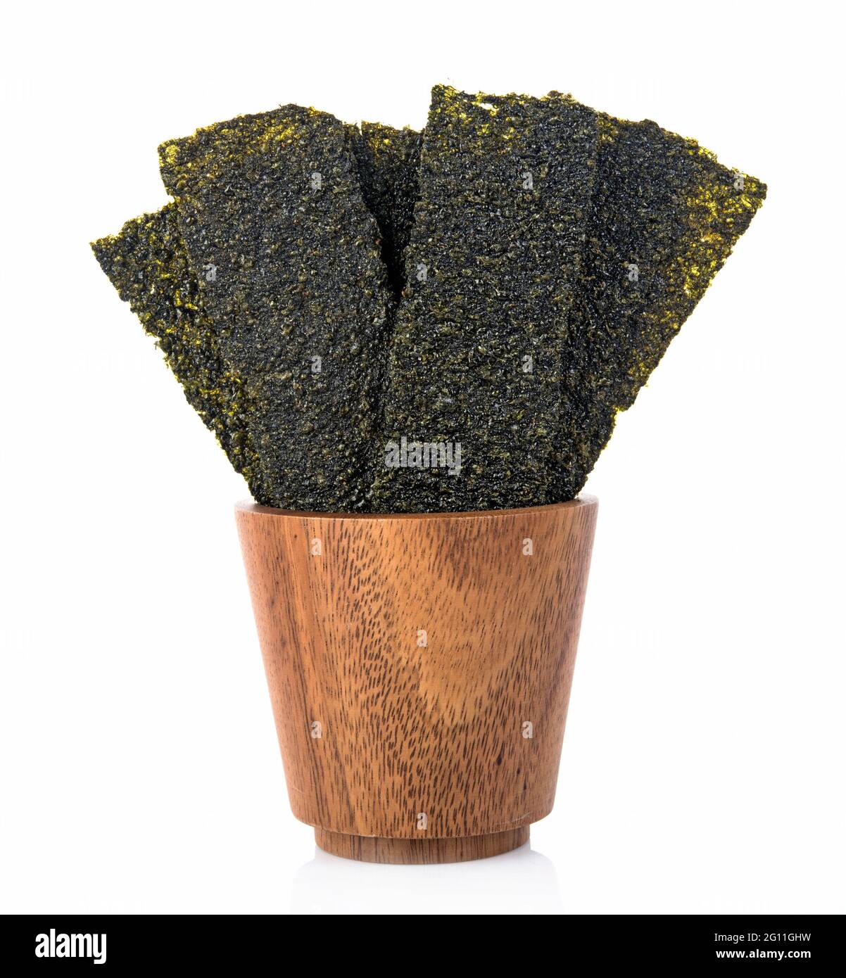 Seaweed in wooden glass isolated on white background Stock Photo - Alamy