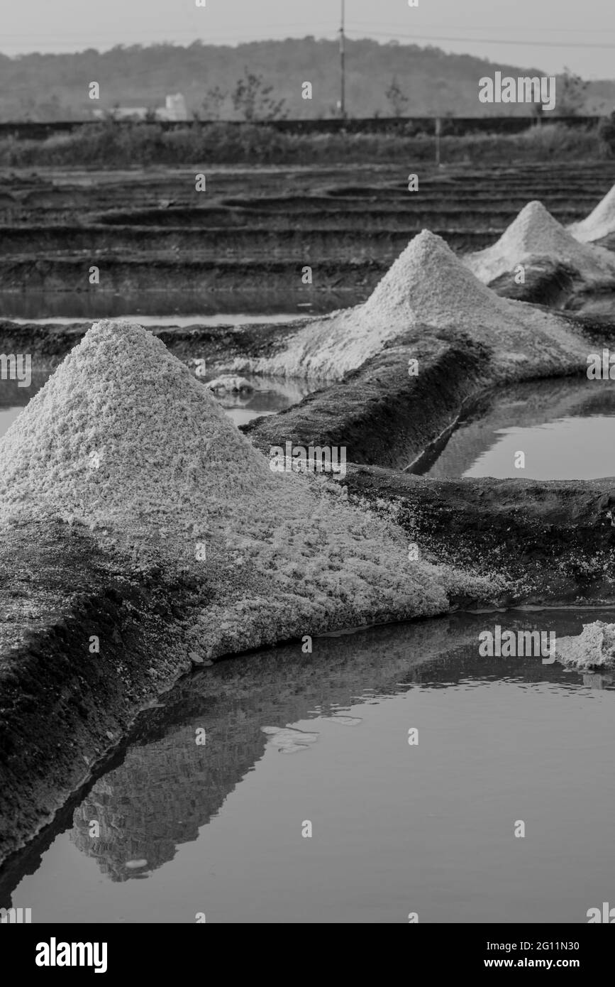 Traditional salt harvesting in salt Black and White Stock Photos ...