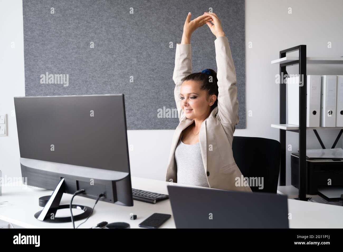 Office Desk Stretch Exercise Workout. Relaxing Stress Break Stock Photo ...
