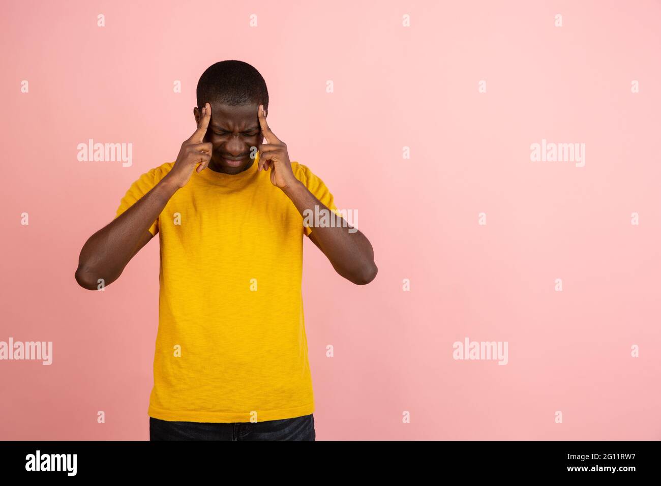 Stressed young african american man feel pain and having terrible ...