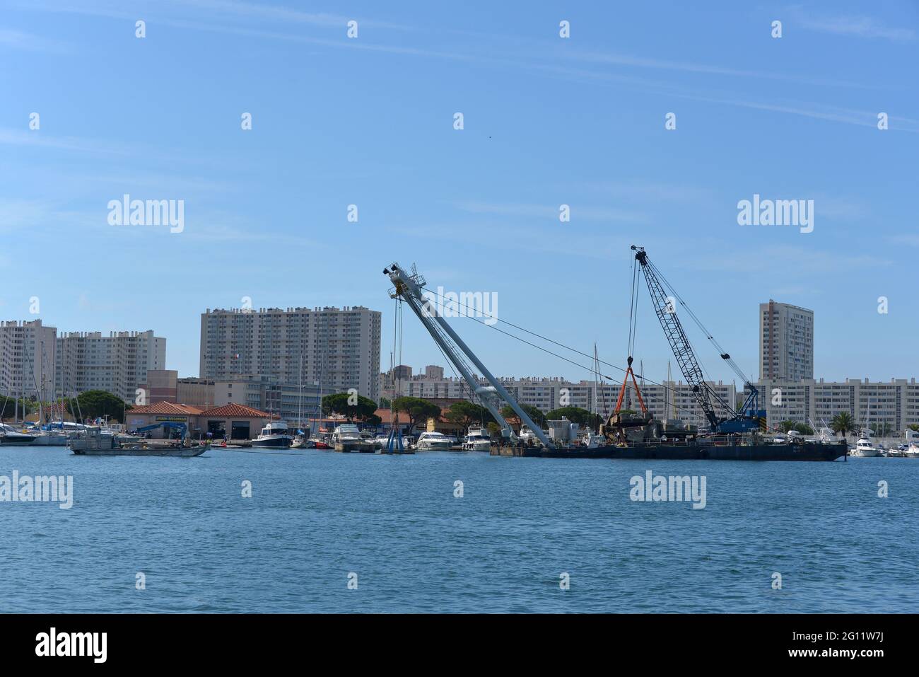 Maritime works company removing the old concrete quays from the Toulon ...