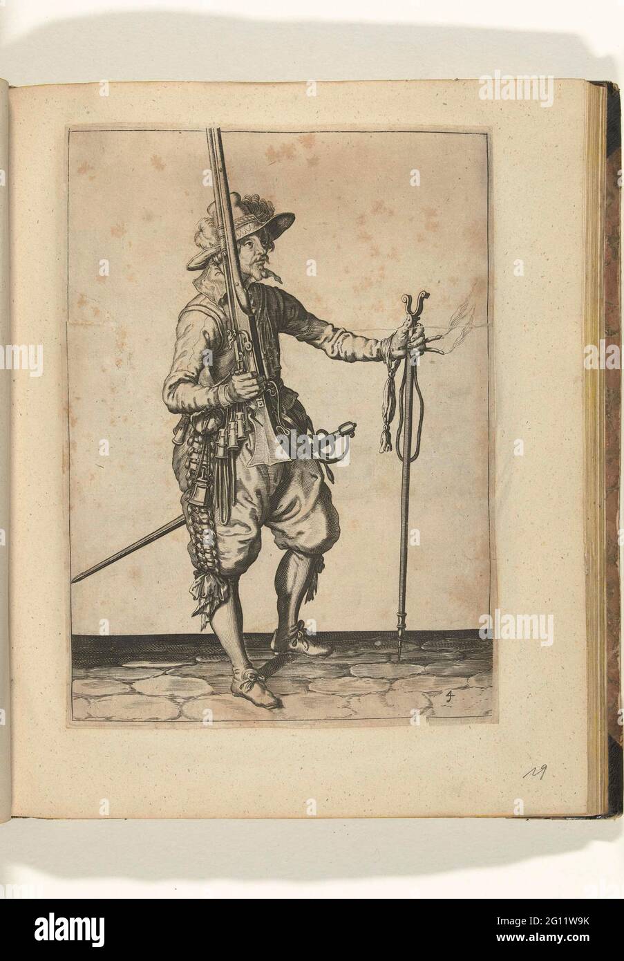 Soldier holding his musket with his right hand upright, in his left ...