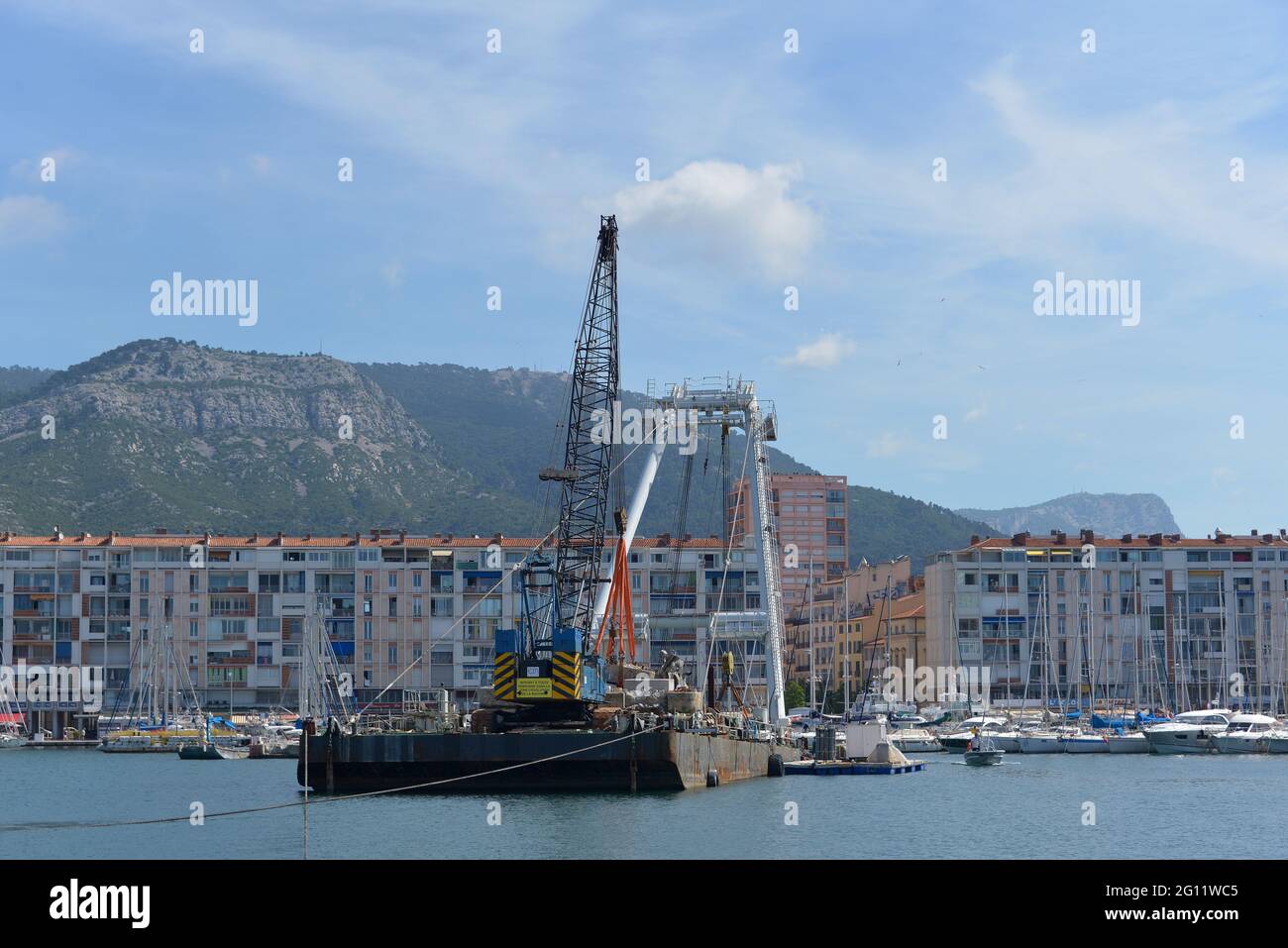 Maritime works company removing the old concrete quays from the Toulon ...