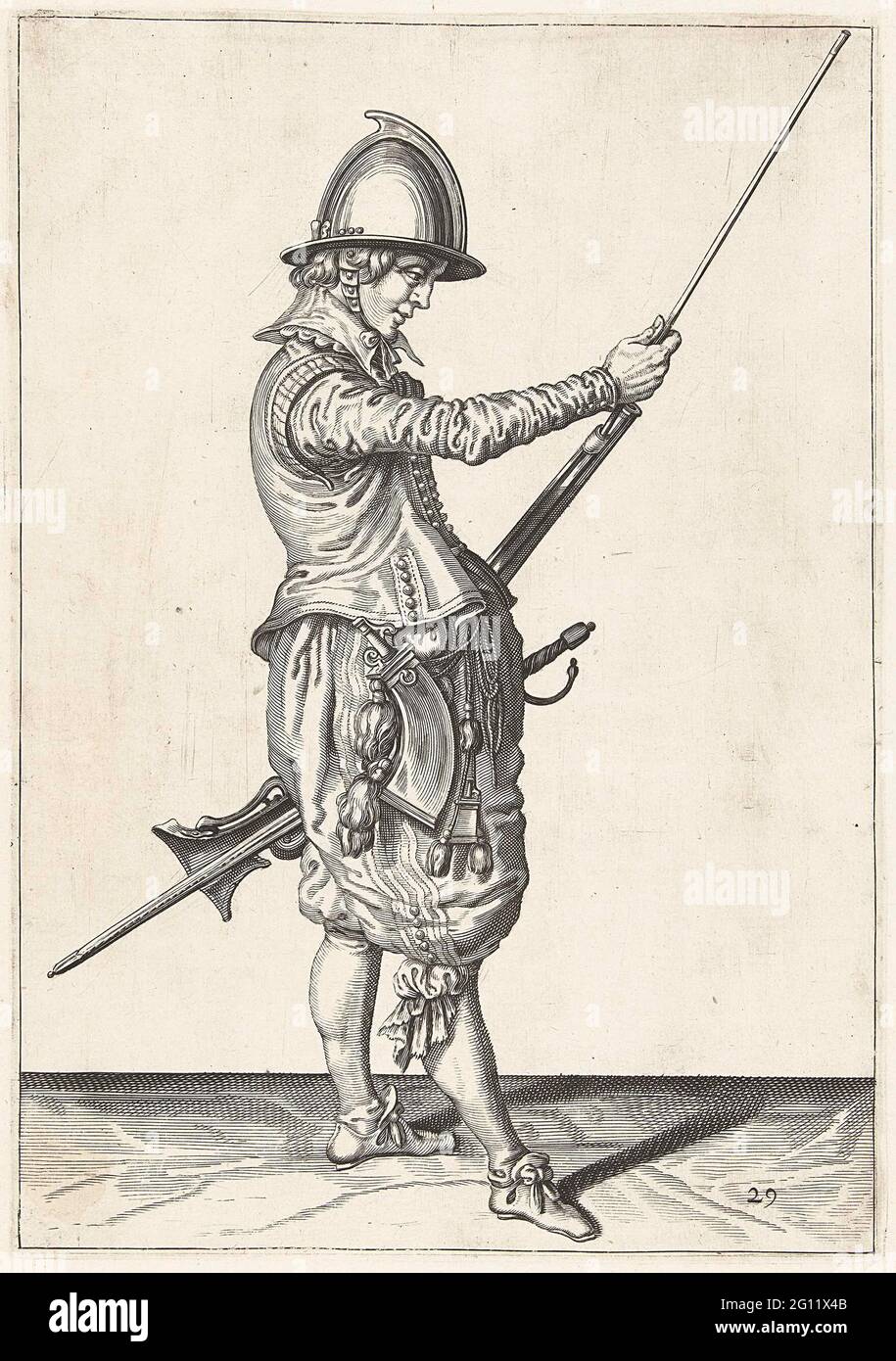 Soldier shifts his loading stick in the holder under the course of his ...