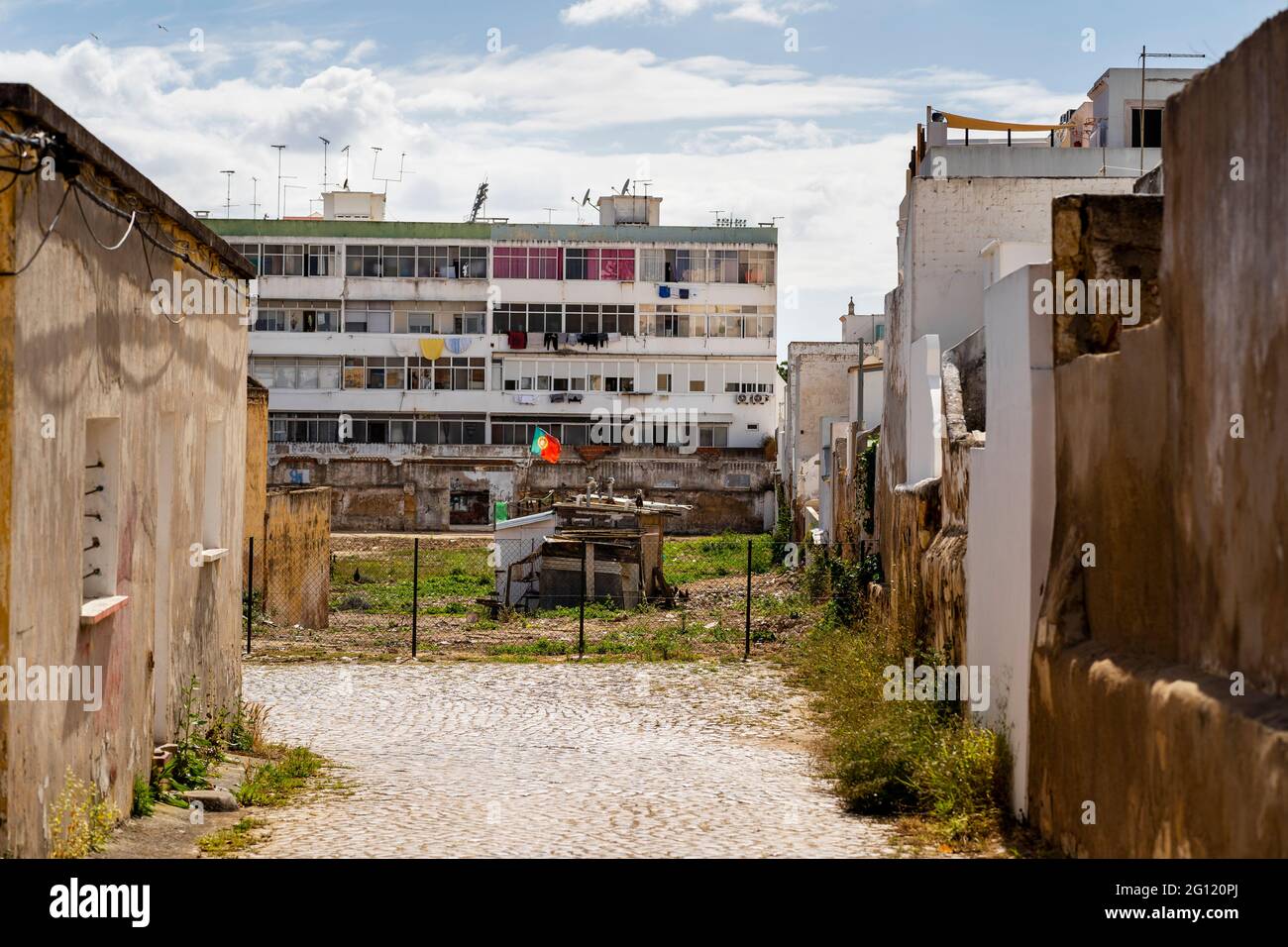 The poor neighborhood where typical architecture meets neglected block ...