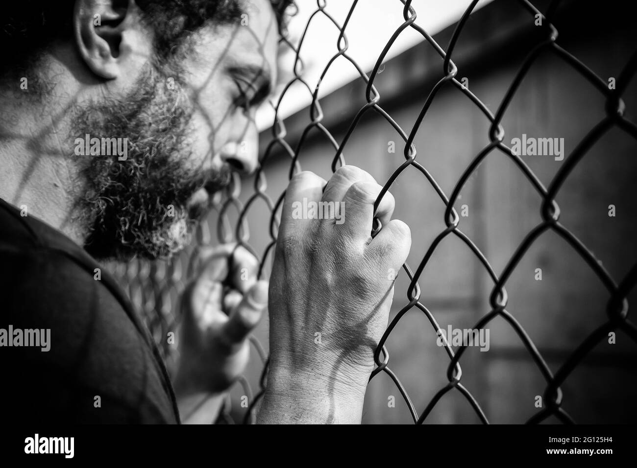 Detail of delinquent young person, locked up and without freedom, jail ...