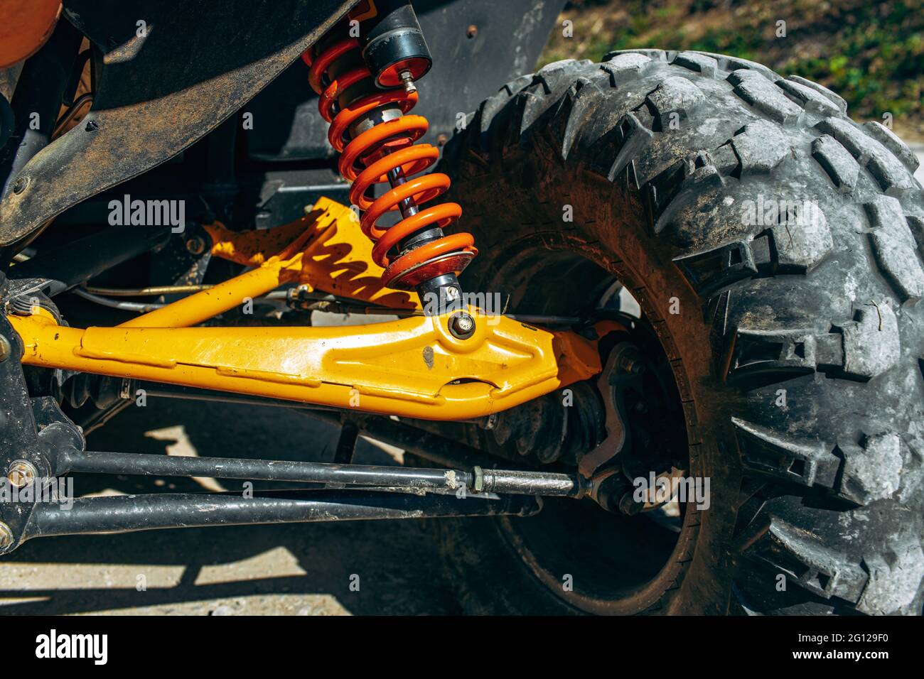 Shock absorber of ATV car close up Stock Photo - Alamy