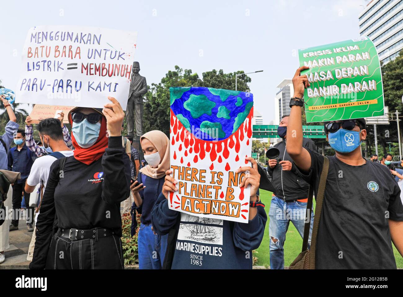 Activists holding placards expressing their opinion as they take part ...