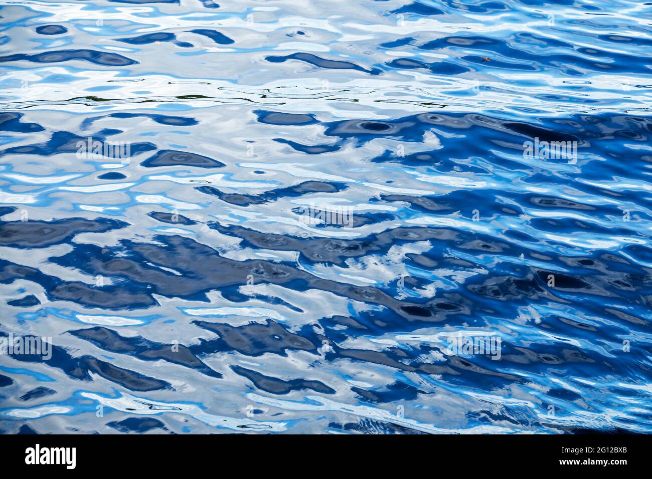 Florida FL Saint St. Lucie River water surface small waves ripples blue ...