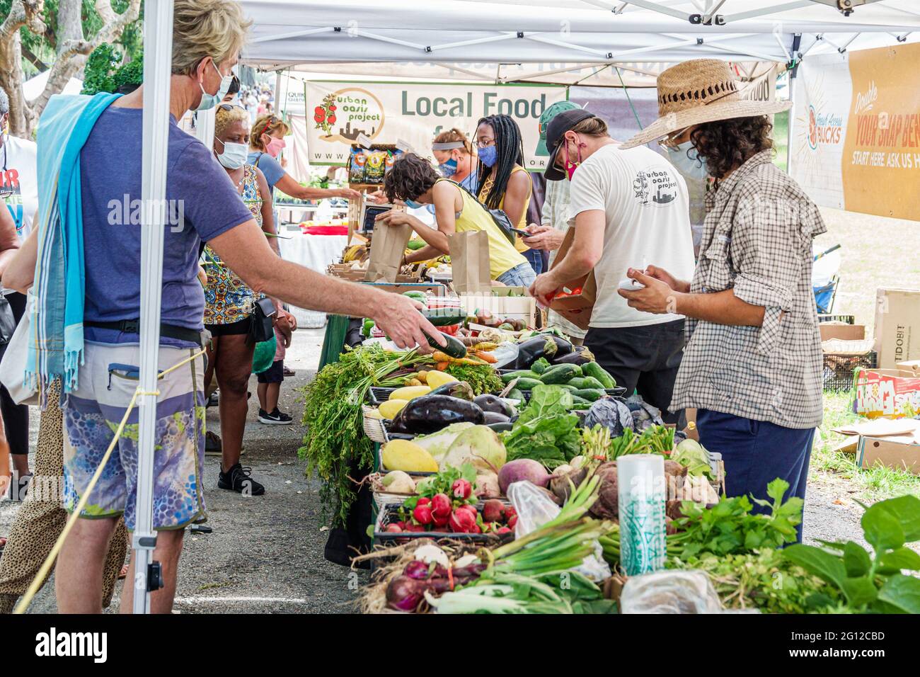 Locally grown produce display sale vegetables greens hi-res stock ...