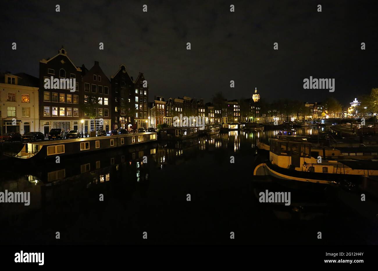 The city lights of Amsterdam in the night Stock Photo - Alamy