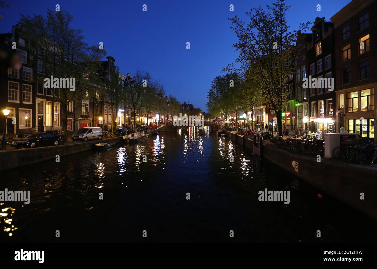 The city lights of Amsterdam in the night Stock Photo - Alamy