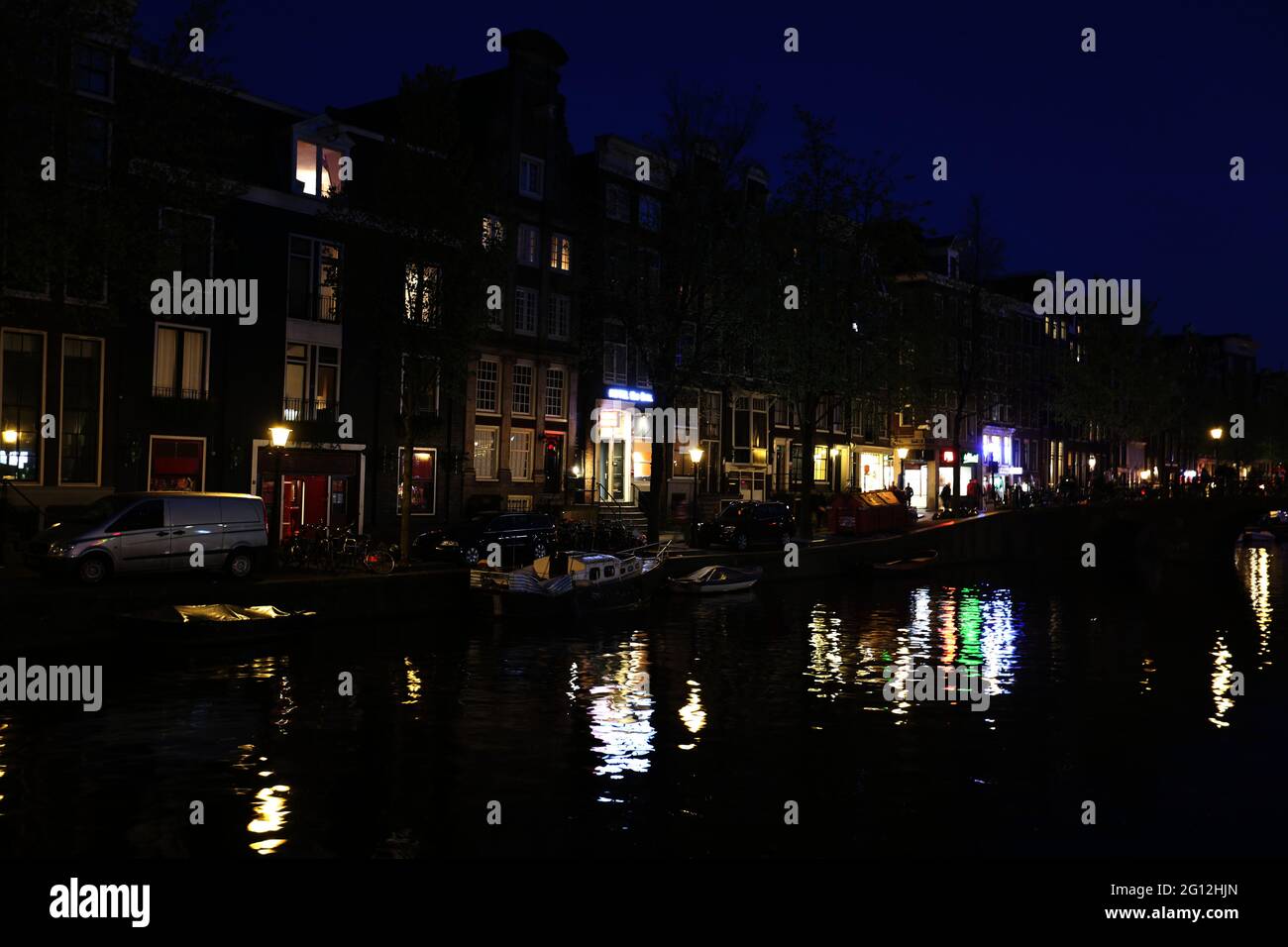 The city lights of Amsterdam in the night Stock Photo - Alamy