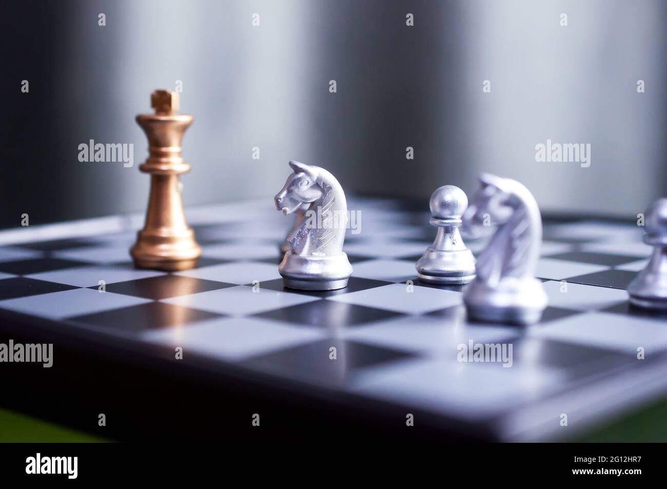 Chess board game silver horse checkmate queen Stock Photo - Alamy