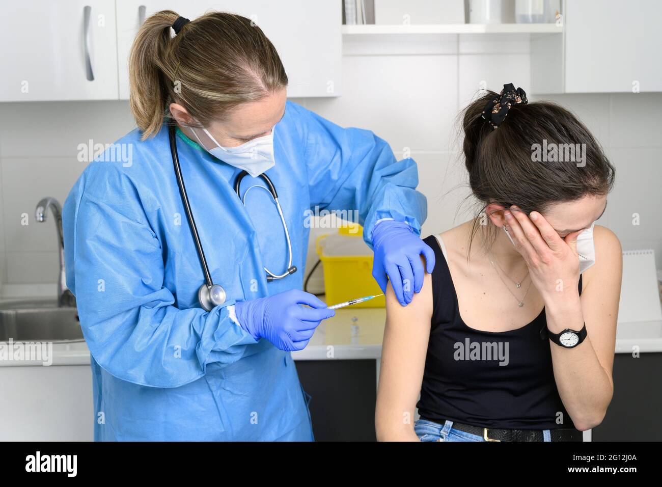 Woman injection arm hi-res stock photography and images - Alamy