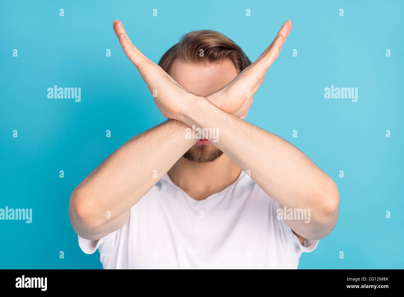 Photo of young person hands crossed covering face show stop enough ...