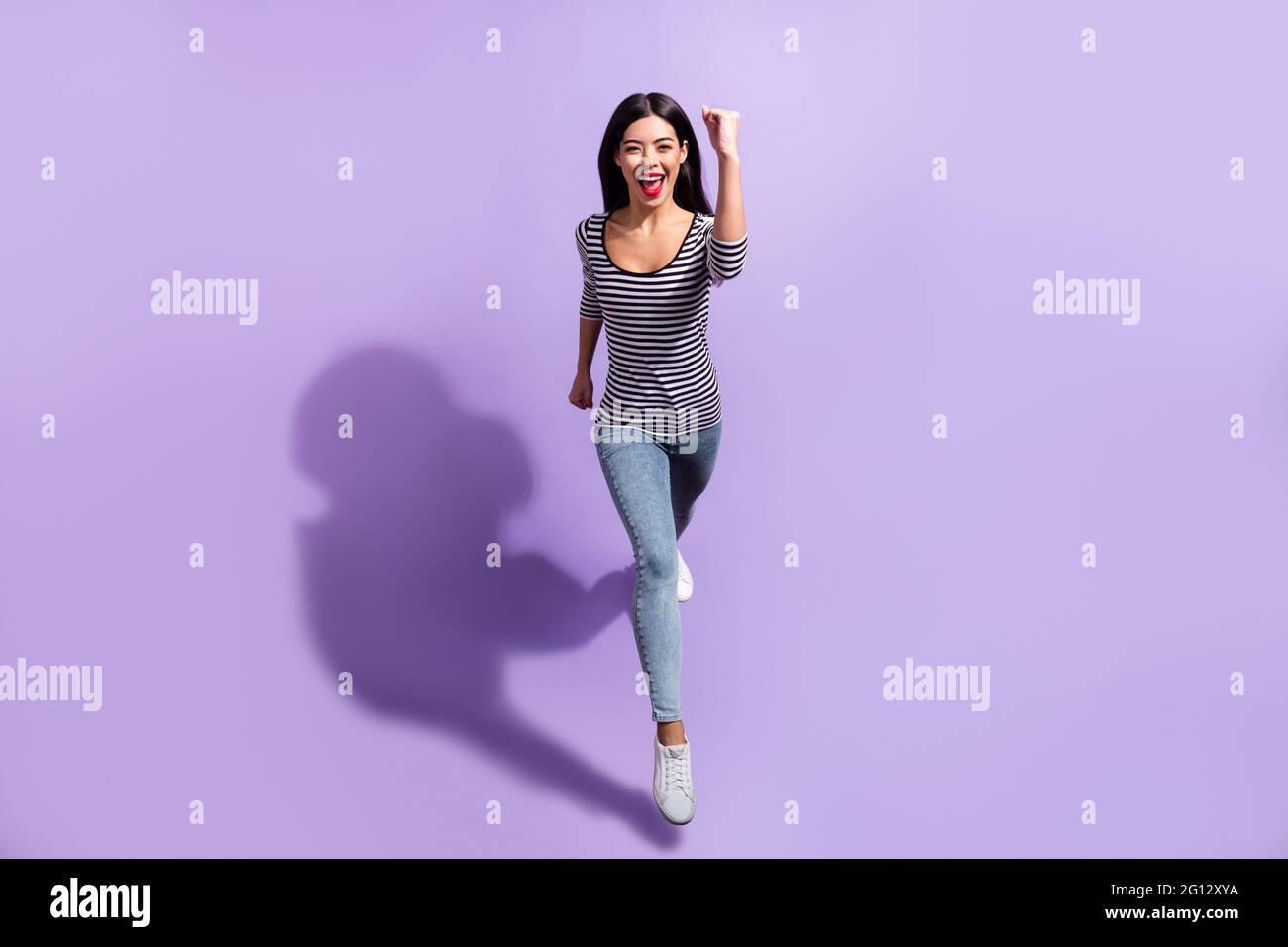 Full size photo of young happy positive smiling woman running fast ...