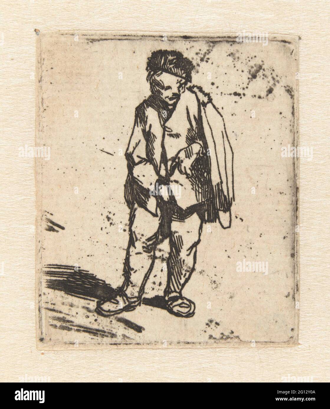 Standing man with cloak over shoulder Stock Photo - Alamy