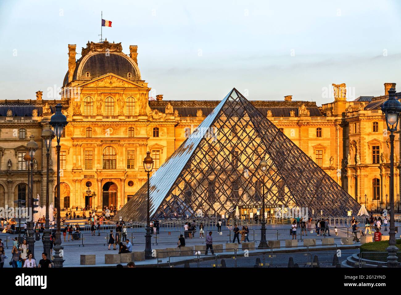 Louvre pyramide at sunset hi-res stock photography and images - Alamy