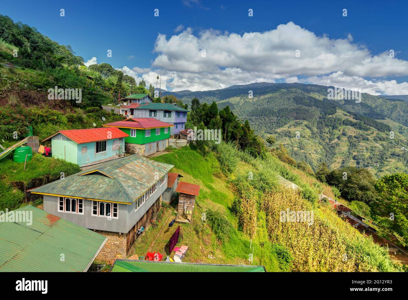 Okhrey village, Himalayan mountain range in the background . Okhrey is ...