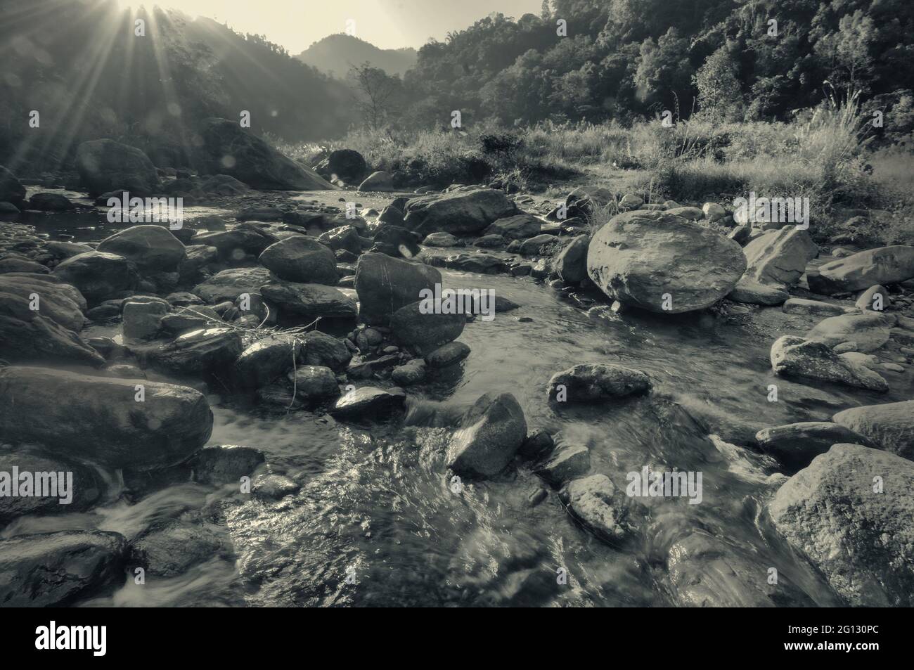 Sunrise over beautiful Reshi River, Sikkim, India. Reshi is one of the ...