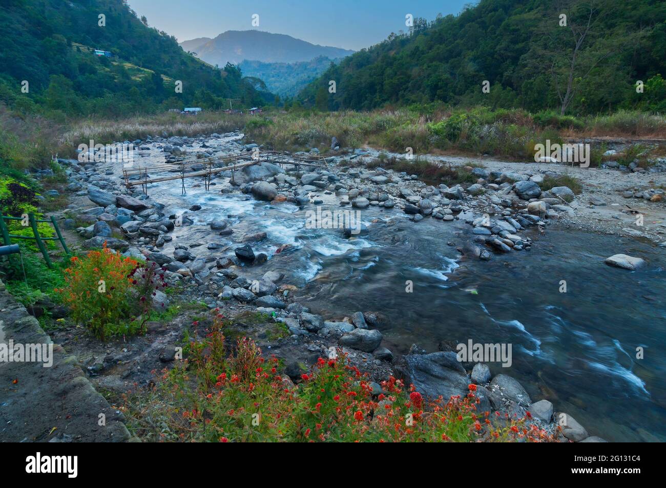 Beautiful Reshi River water flowing through stones and rocks at dawn ...
