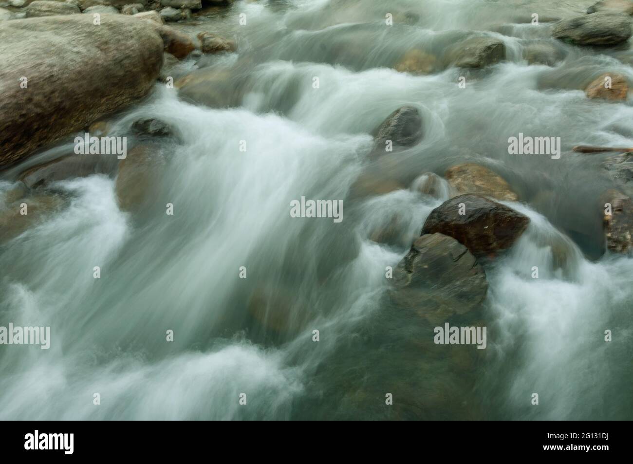 Beautiful Reshi River water flowing through stones and rocks at dawn ...