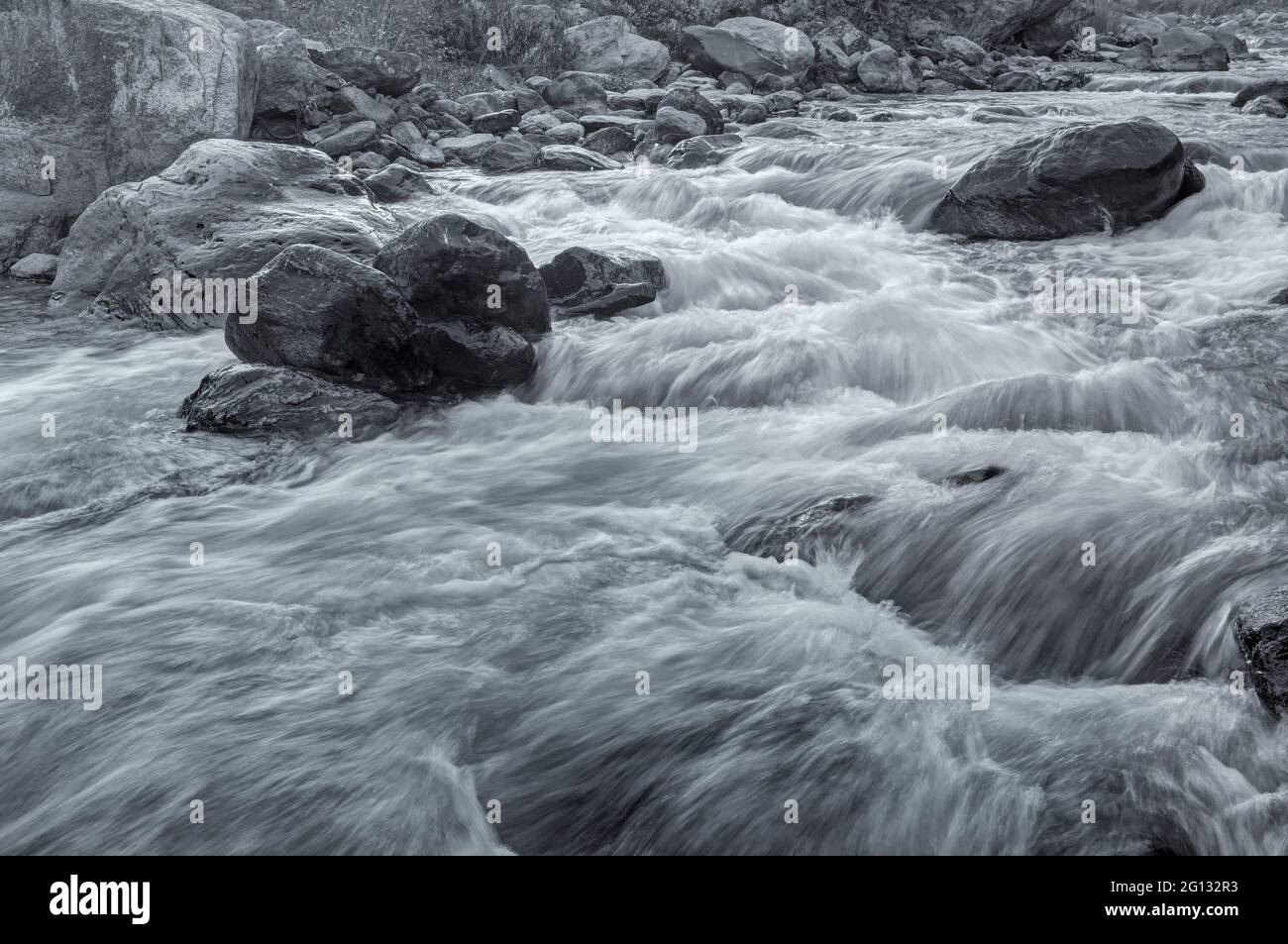 Beautiful Reshi River water flowing through stones and rocks at dawn ...