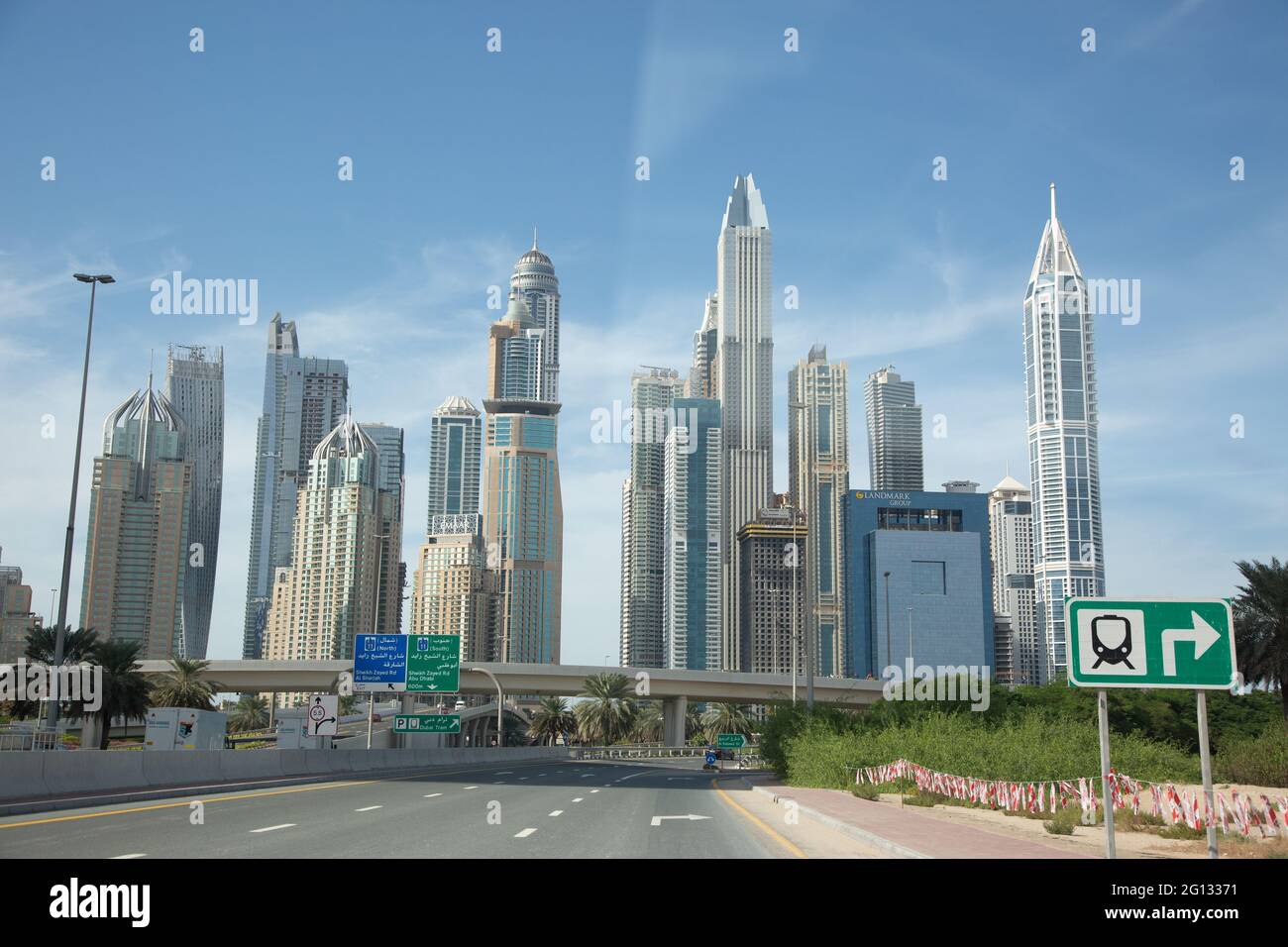 Driving on Sheikh Zayed Road with a view of the Dubai Marina skyline ...