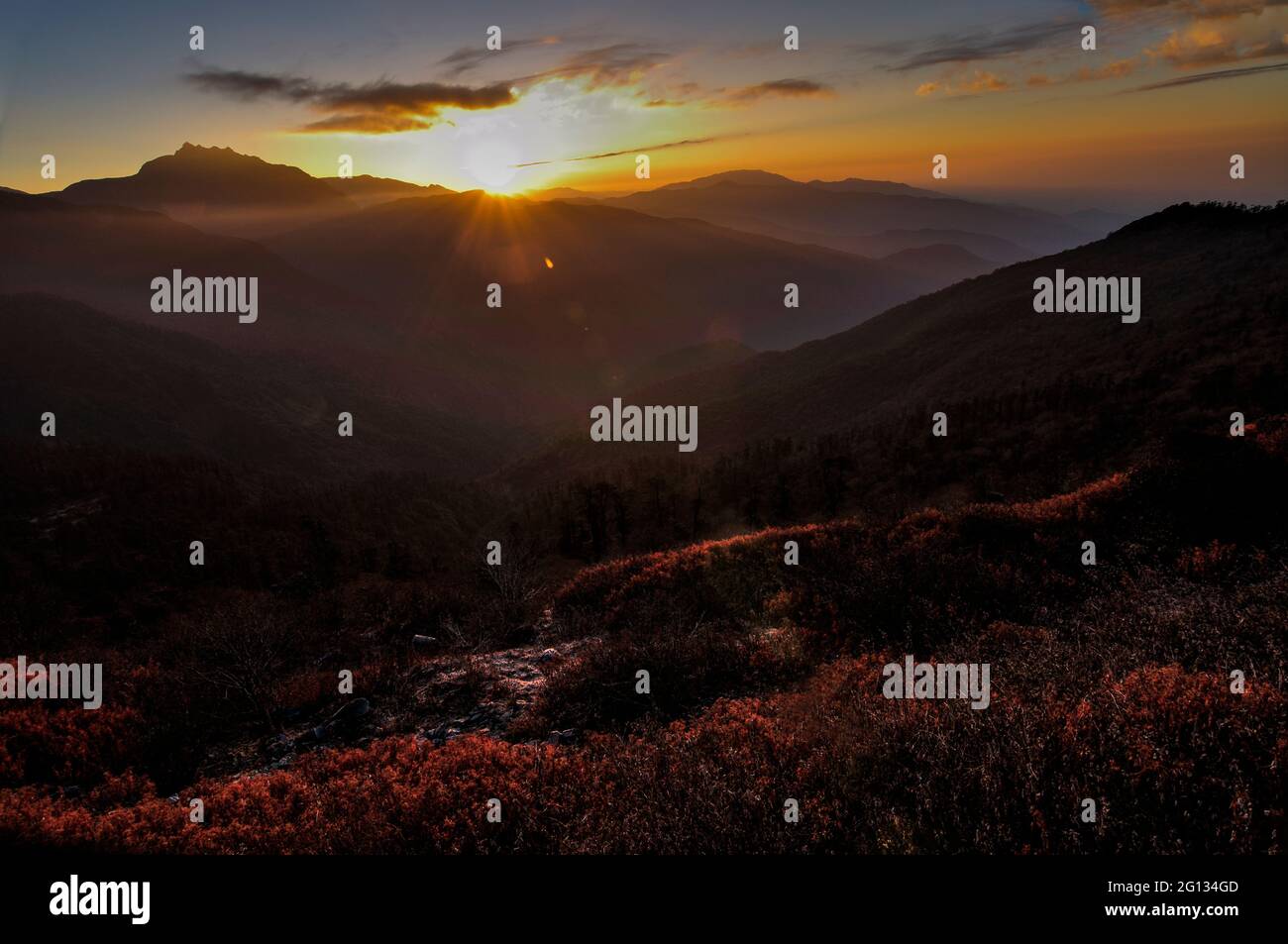 Beautiful Sunrise over valley of Himalayan mountains in Sikkim, India ...