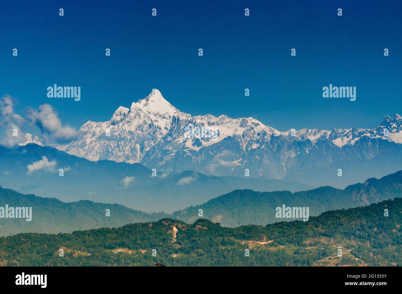 Beautiful view of Kanchenjunga mountain range with first daylight on it ...