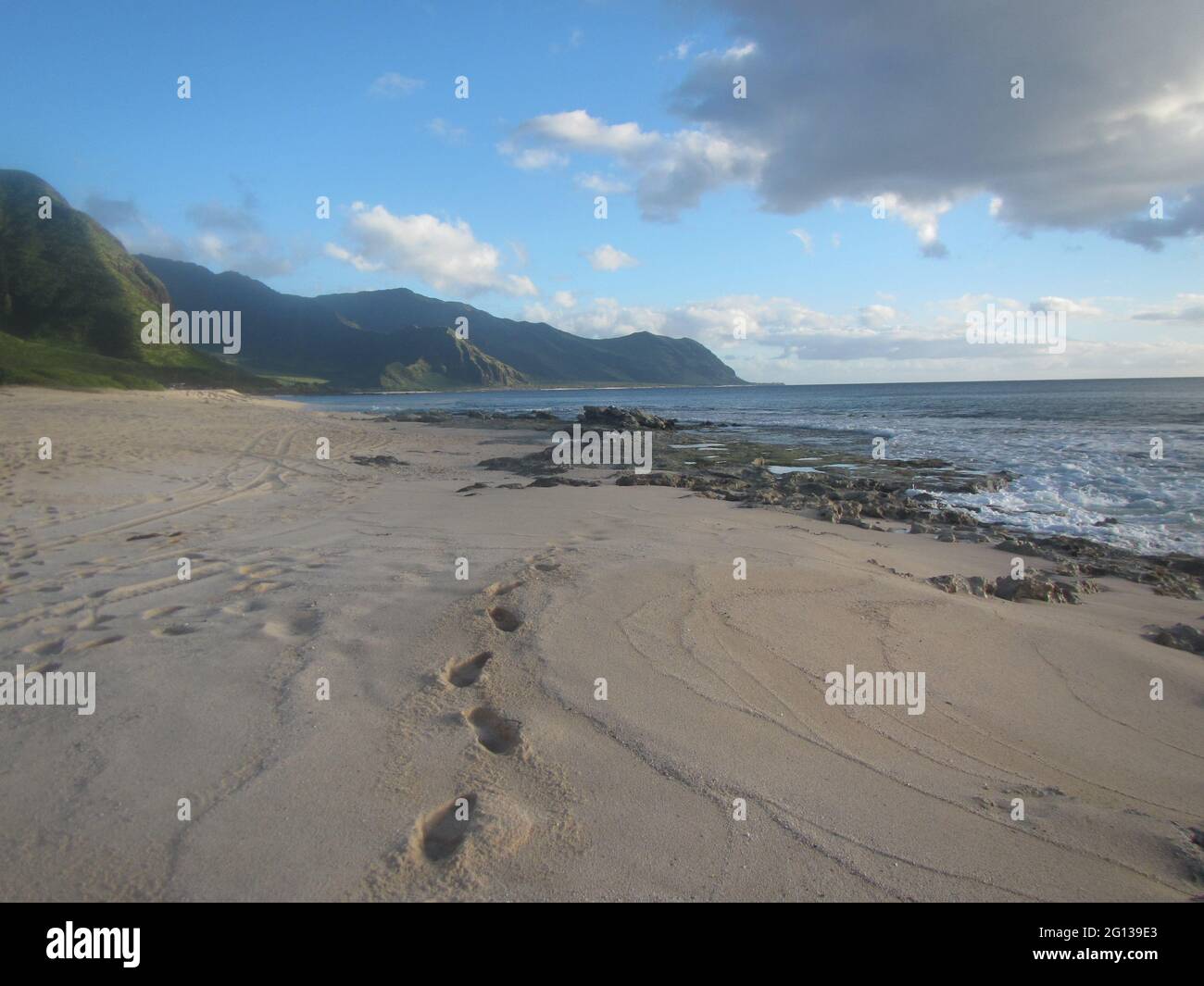 empty beach of a deserted tropical island on sunny morning Stock Photo ...