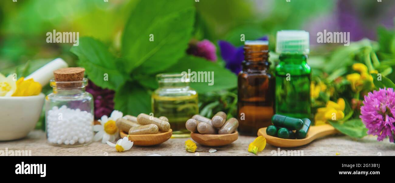 Homeopathy herbs and medicine pills. Selective focus. Nature Stock ...