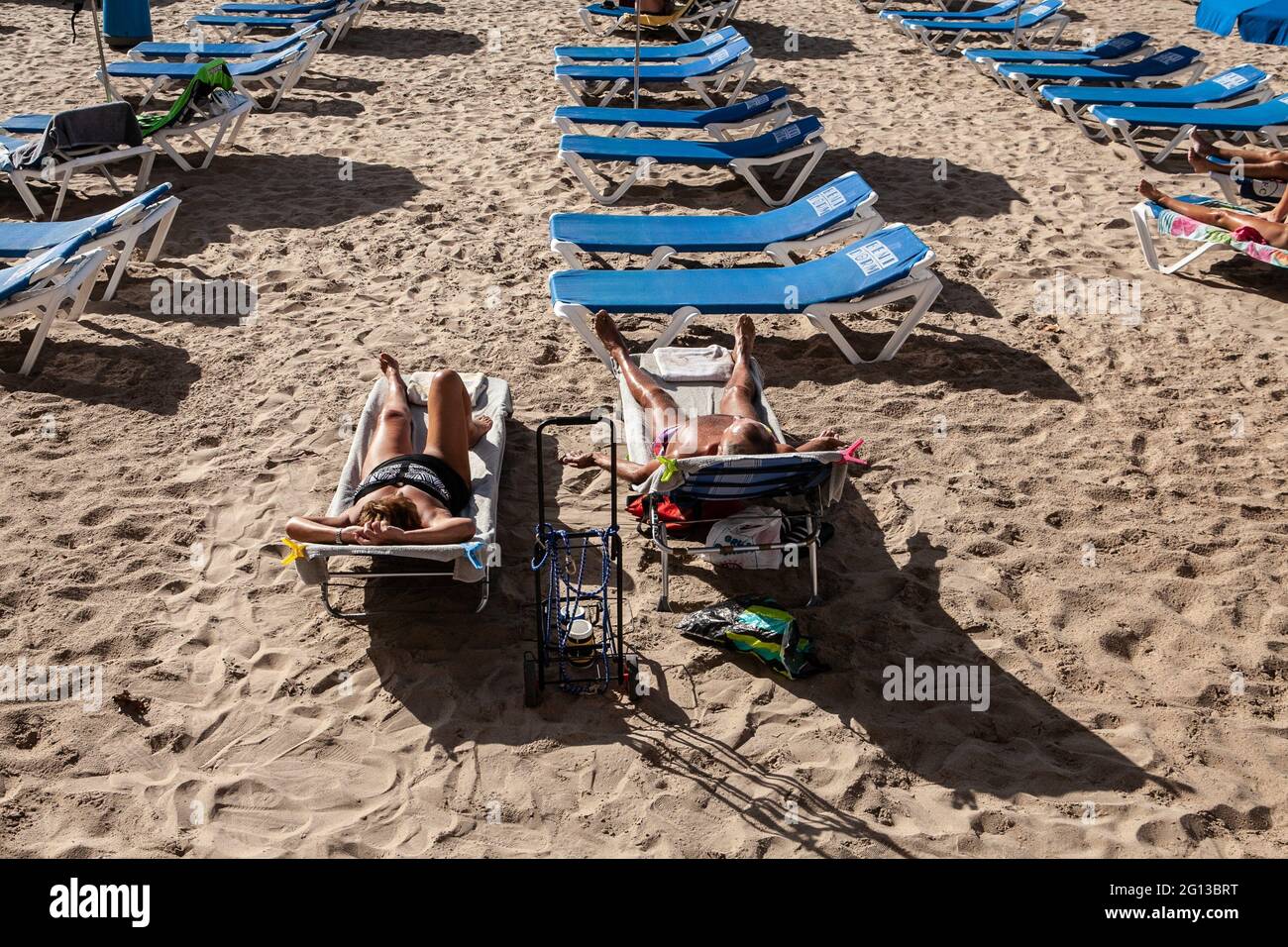 Benidorm beach sunbathing hi-res stock photography and images - Alamy