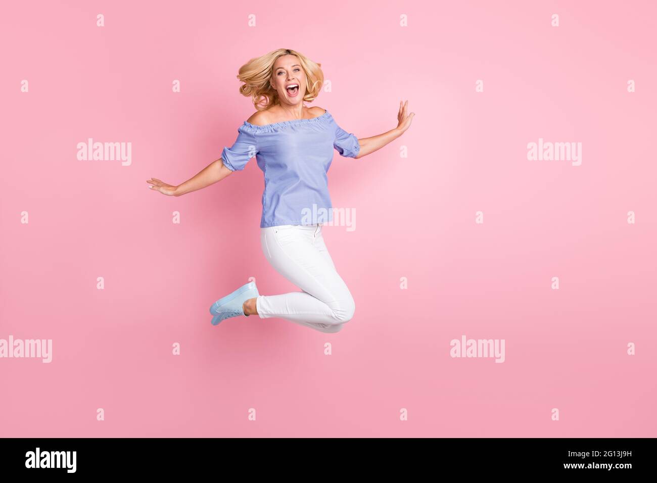 Full size photo of young happy pretty crazy screaming girl jumping in ...