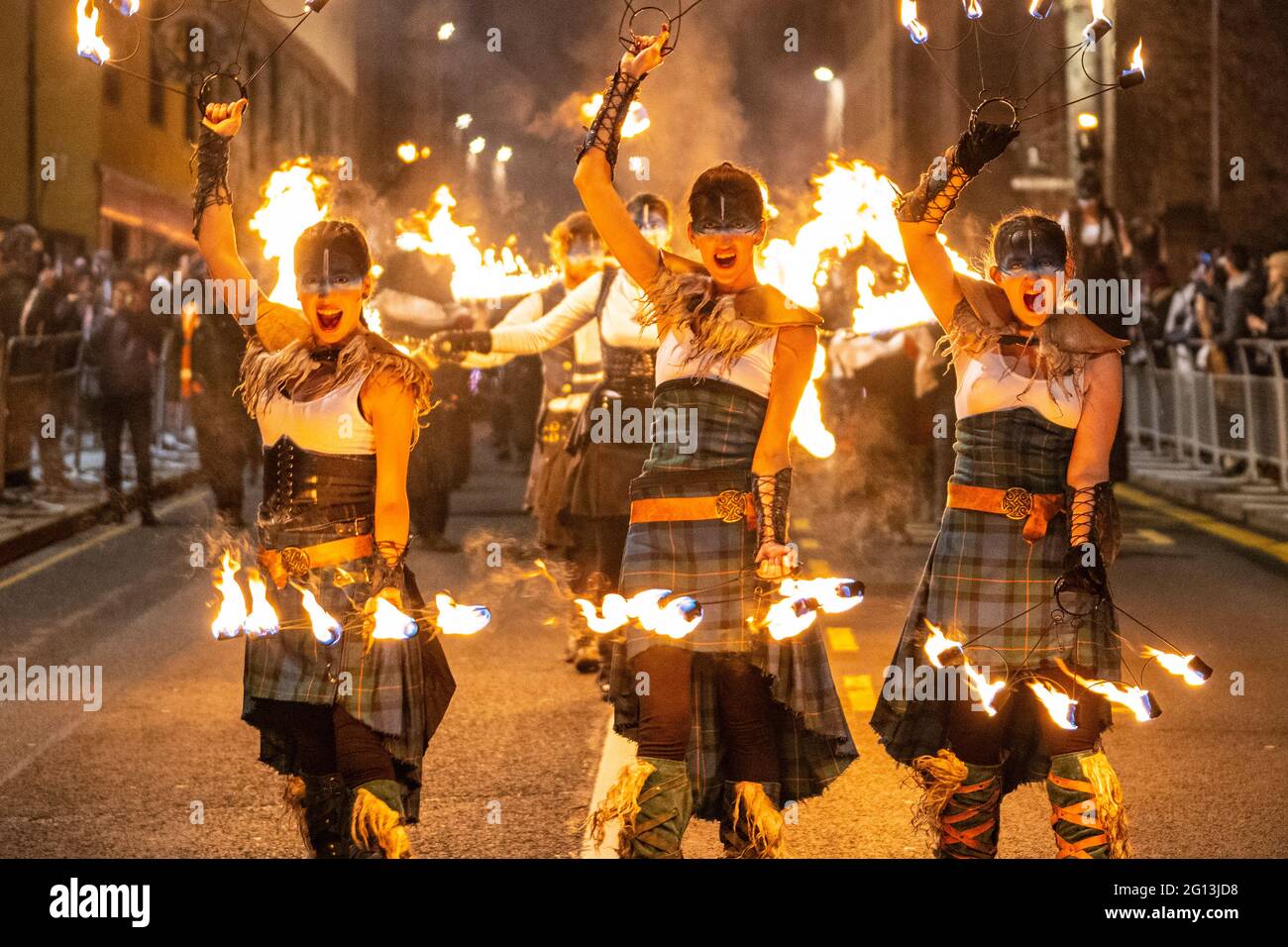 Performers with fire torches during traditional Hogmanay torchlight ...