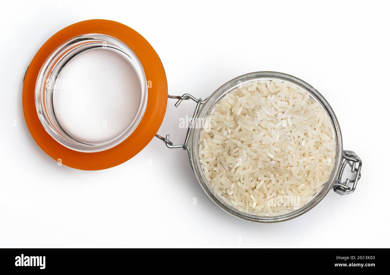 Open jar with raw and dry white rice. Top view. Isolated on white ...