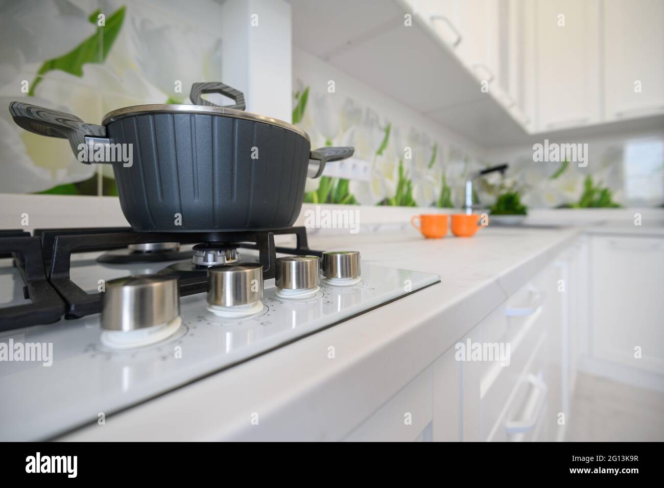 Modern luxurious kitchen closeup view to gas stove Stock Photo - Alamy