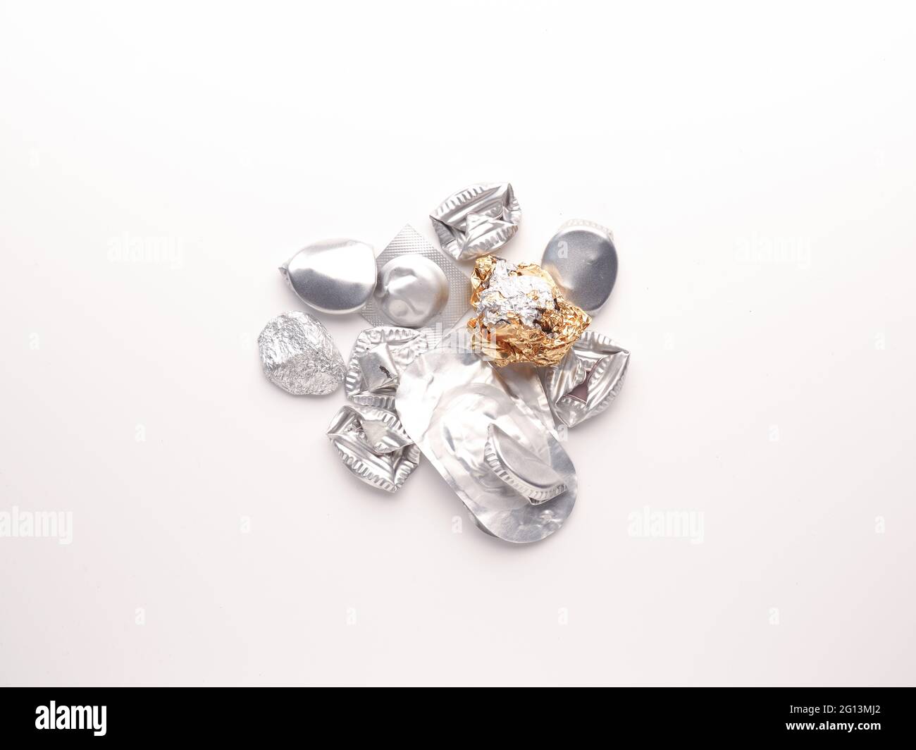 Aluminum waste on a white background, aluminum in daily use, recycling ...