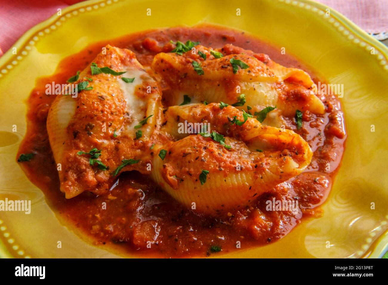 Italian stuffed conchiglioni shell pasta baked in marinara tomato sauce ...