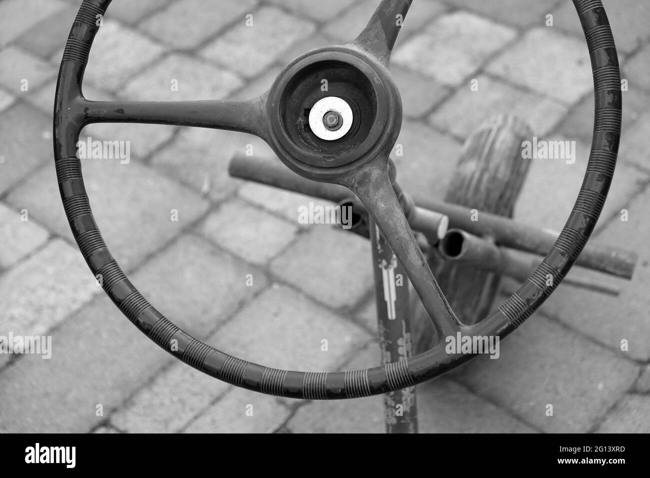 High-angle shot of a steering wheel on a paved Stock Photo - Alamy