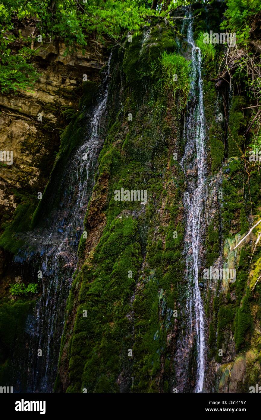 Summer background with waterfall stream among rocks Stock Photo - Alamy