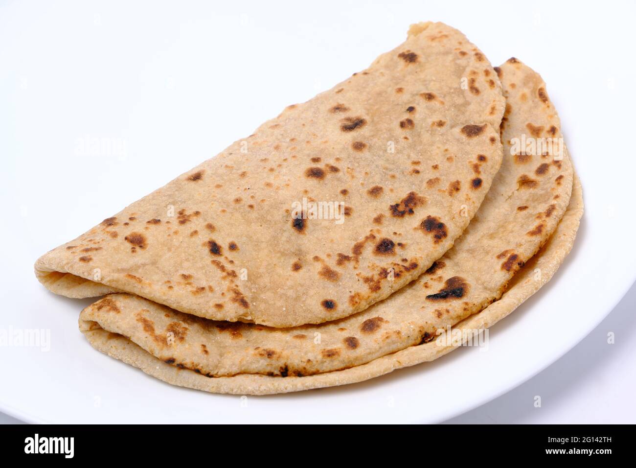 Indian style bread or roti served in a plate Stock Photo - Alamy