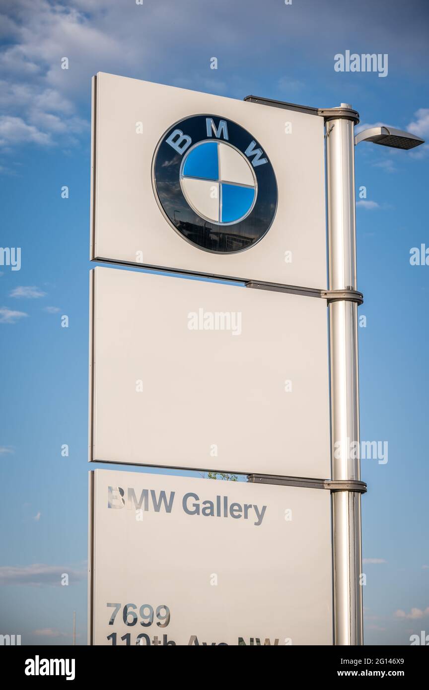 Calgary, Alberta - June 3, 2021: BMW logo sign and brand text of car ...