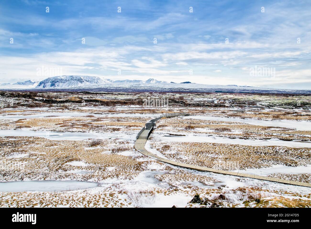 Beautiful winter Icelandic landscape with mountains covered in snow and ...