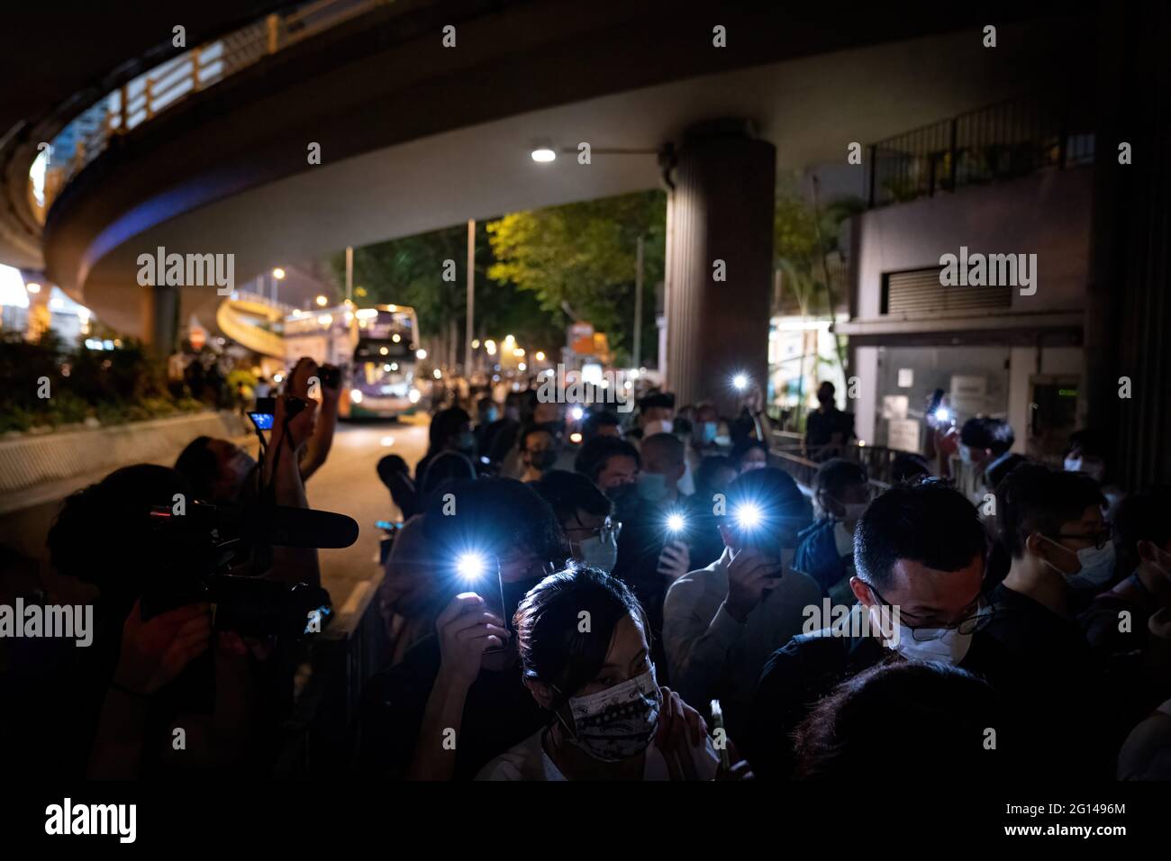 People flashing their mobile phones as part of the small protests by ...