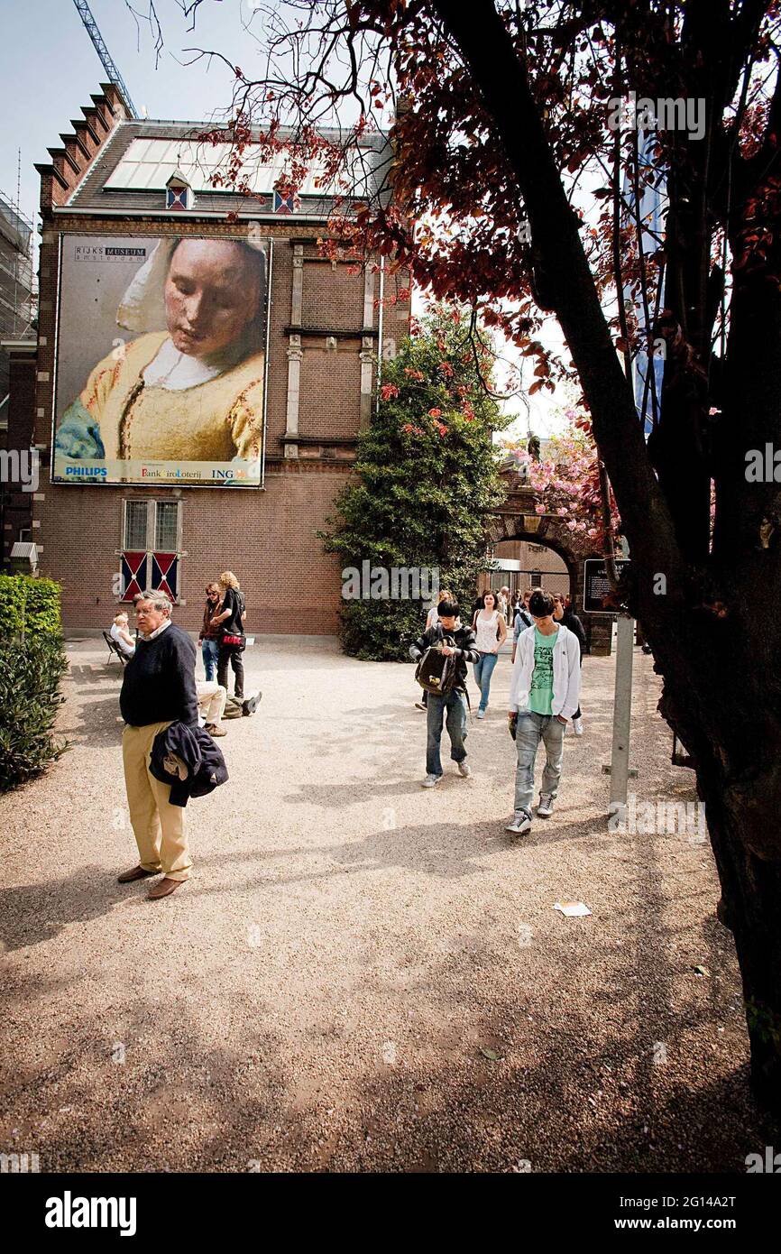 Visitors walking across garden path, coming from the exit; Exterior Philips wing, April 2010 ...