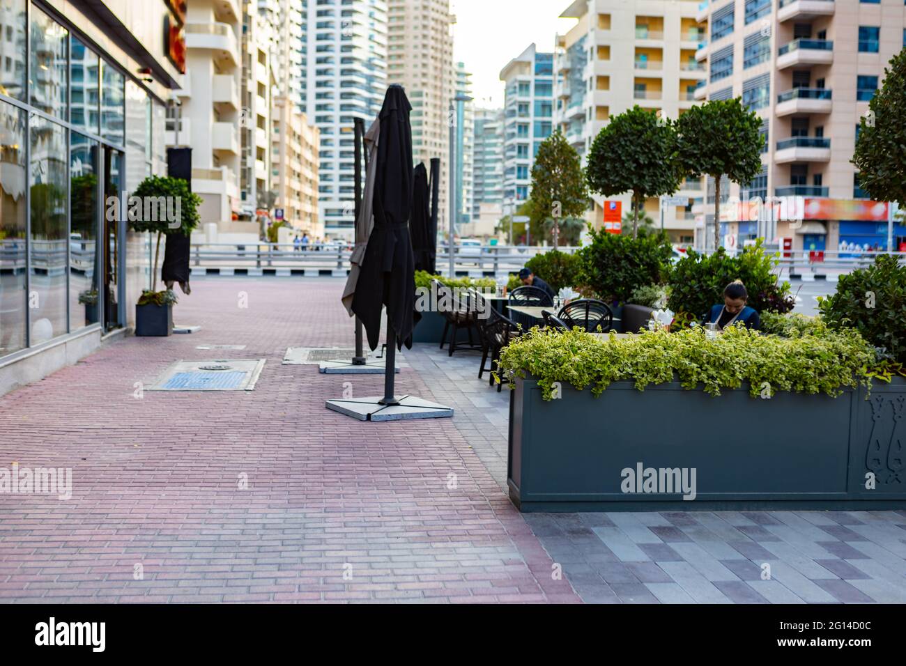 Dubai, UAE - MARCH, 2020: Beautiful empty street cafe in Dubai Stock ...
