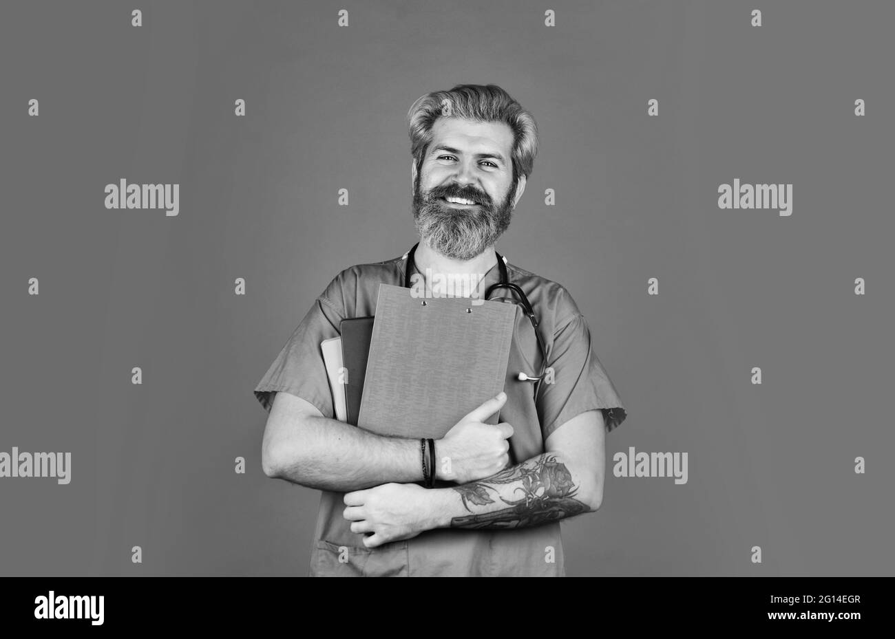 Man bearded handsome doctor work at hospital. Hospital admission ...